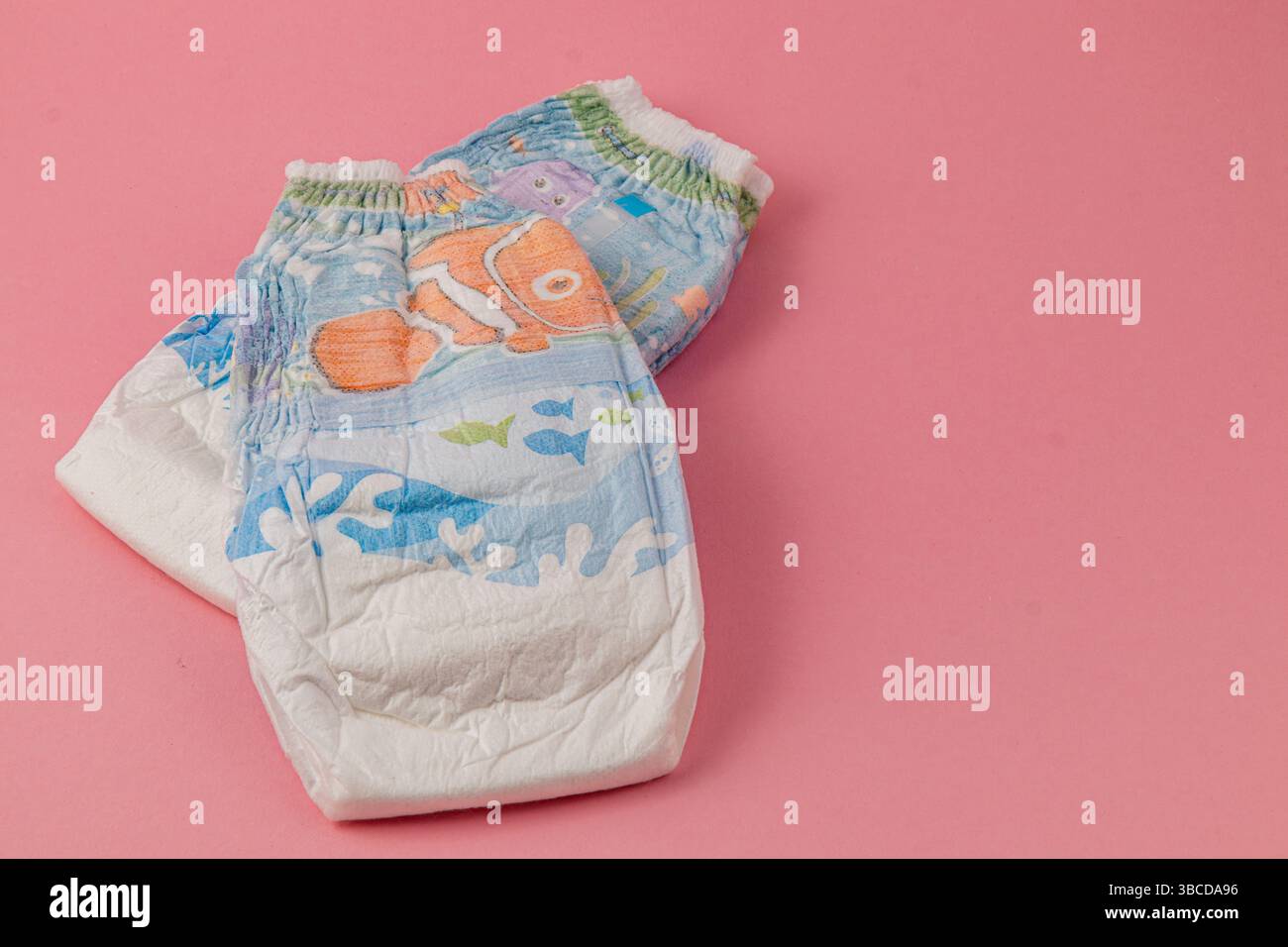 Lviv Ukraine 05.06.25 Two cute children's diapers featuring playful ...
