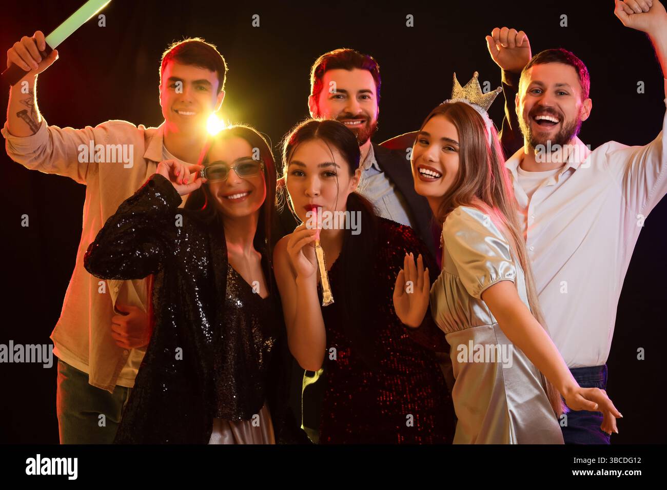 Group of young people at party in night club Stock Photo - Alamy