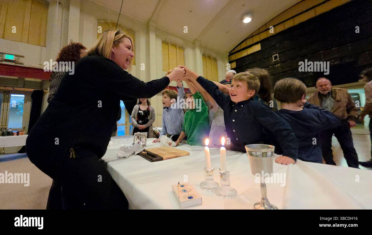 Cantor Ruth Berman Harris, left, who leads the congregation in lieu of ...