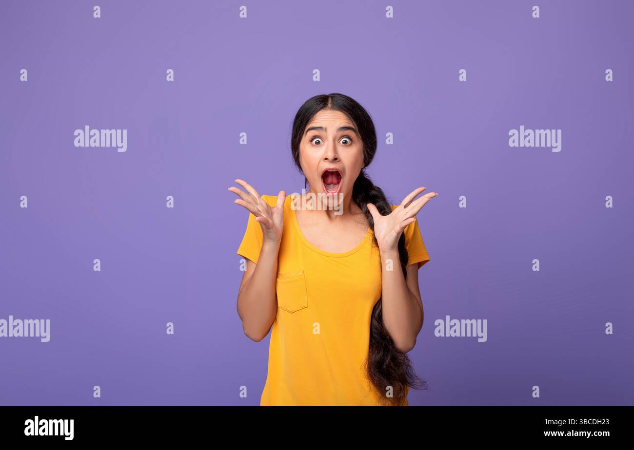Close up portrait of shocked young indian woman screaming Stock Photo ...