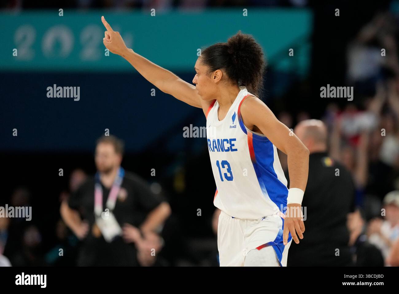 FILE - Janelle Salaun (13), of France, celebrates a three-pointer ...
