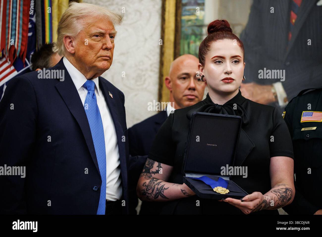 US President Donald Trump presents a Medal of Sacrifice to Alexandria ...