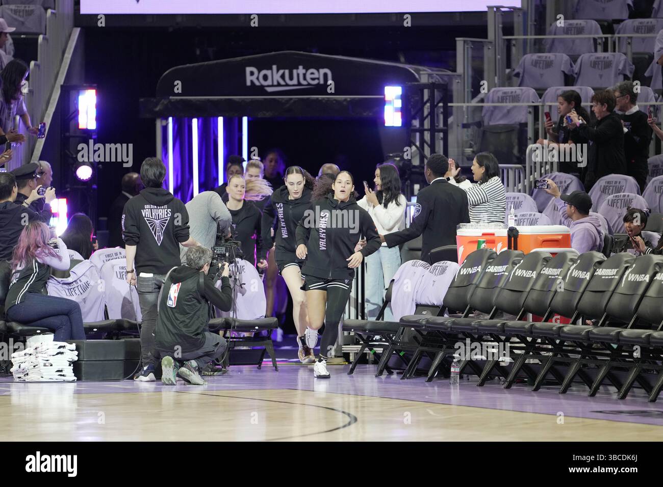 Golden State Valkyries team running onto the court for a WNBA regular ...