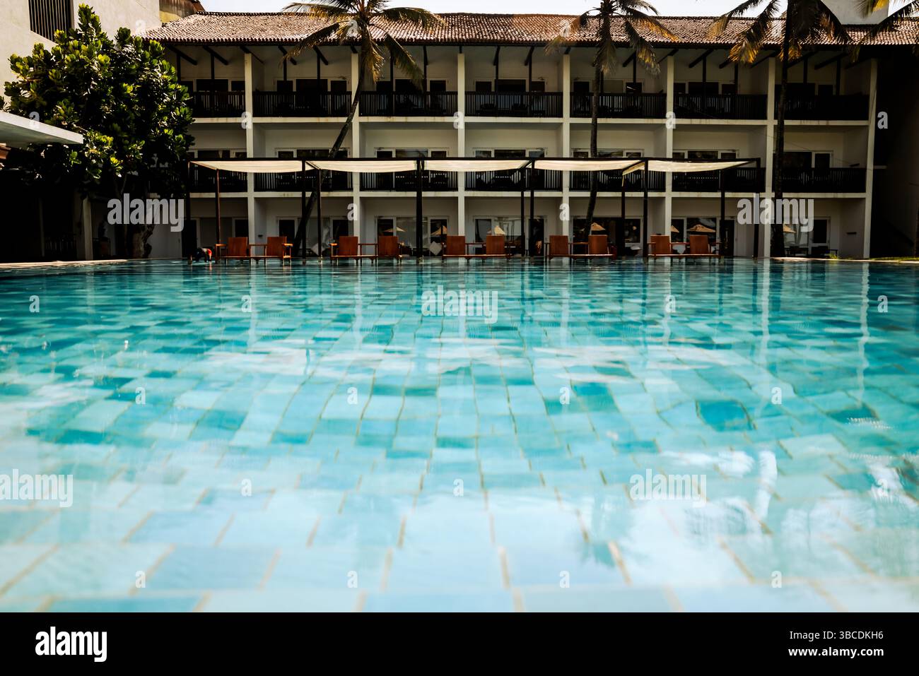 Negombo, Sri Lanka - February 23, 2025: The swimming pool and resort ...