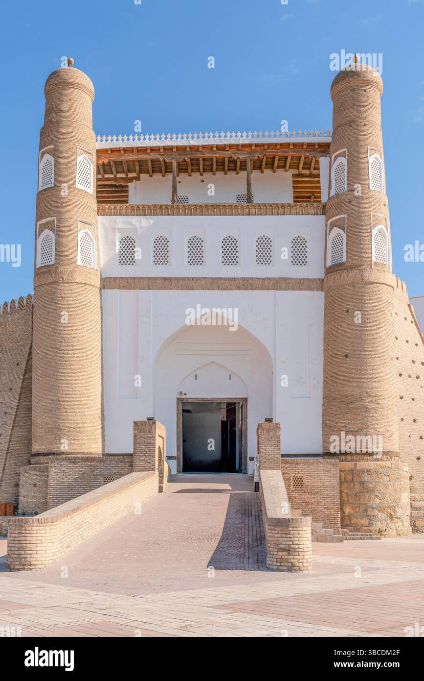 A monumental entrance with two towers marks the Ark Fortress in Bukhara ...