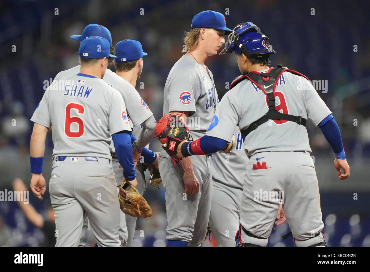 Chicago Cubs starting pitcher Ben Brown, center, is relieved during the ...