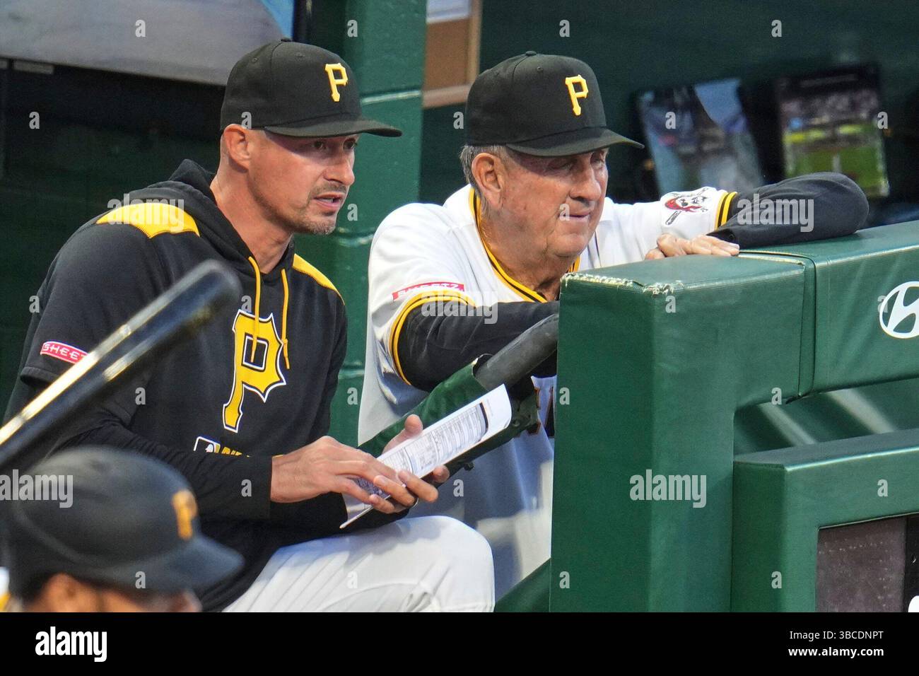 Pittsburgh Pirates manager Don Kelly, left, talks with coach Gene ...