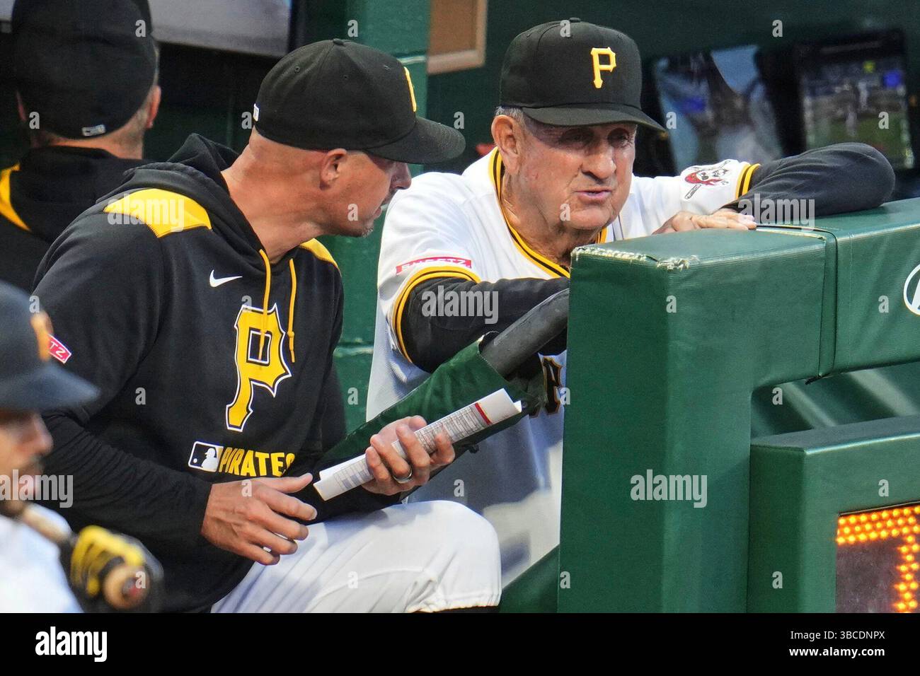 Pittsburgh Pirates manager Don Kelly, left, talks with coach Gene ...