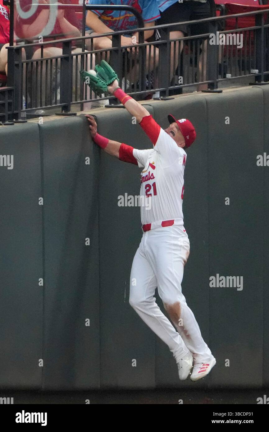 St. Louis Cardinals left fielder Lars Nootbaar (21) catches a fly ball ...