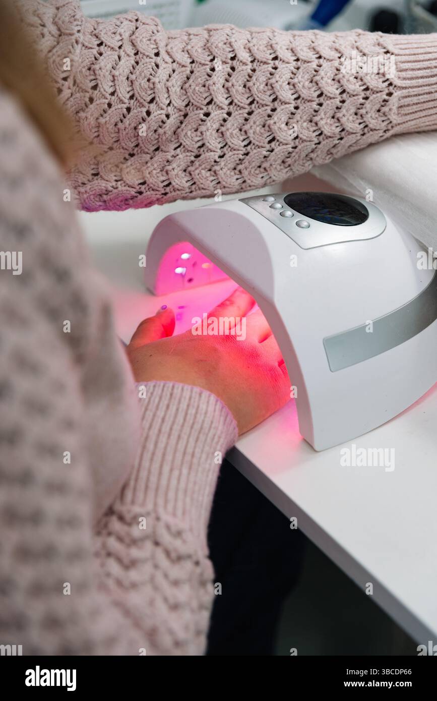 Uv lamp curing nails under hi-res stock photography and images - Alamy