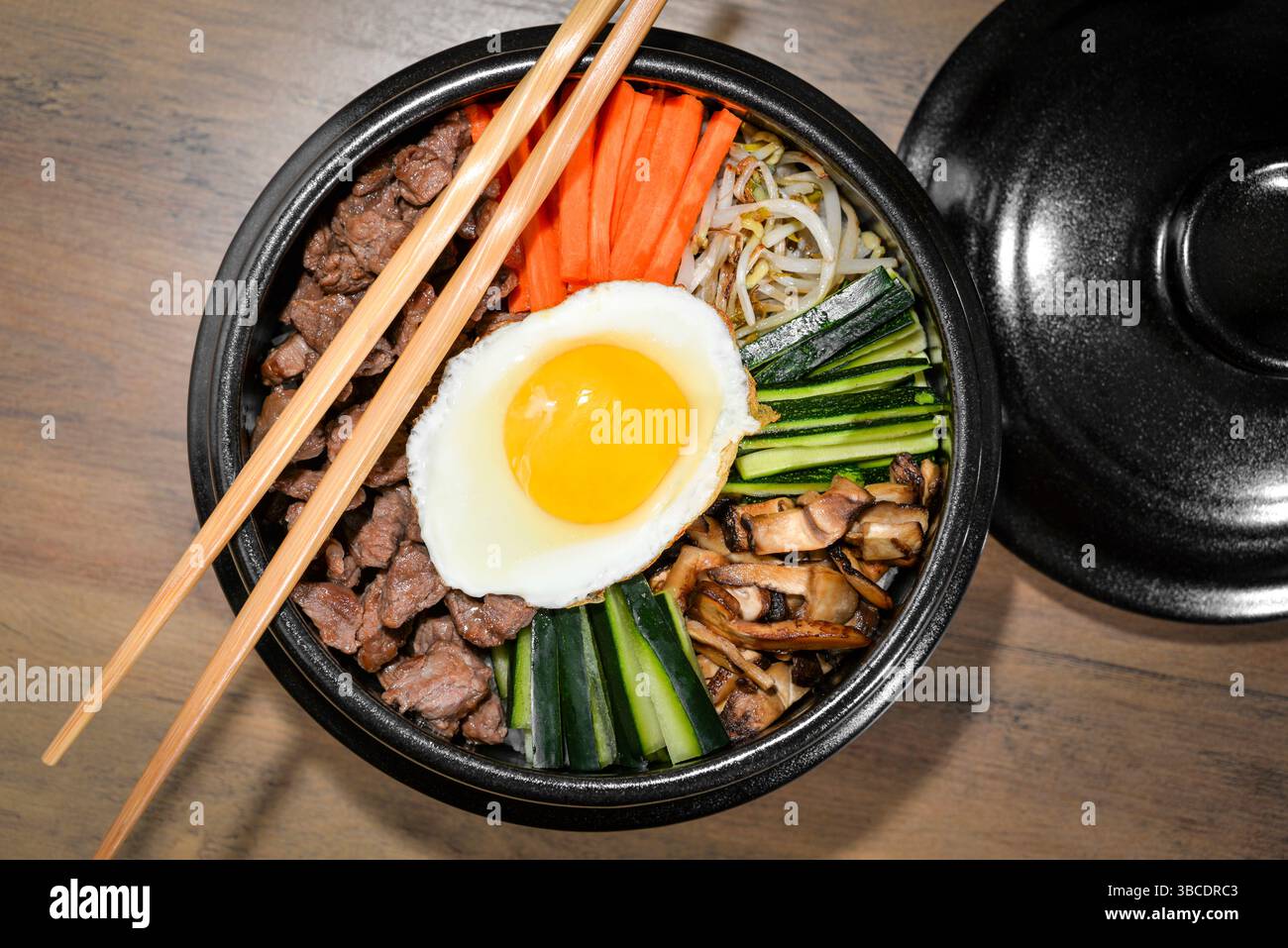 Bibimbap, a Korean mixed rice dish Stock Photo - Alamy