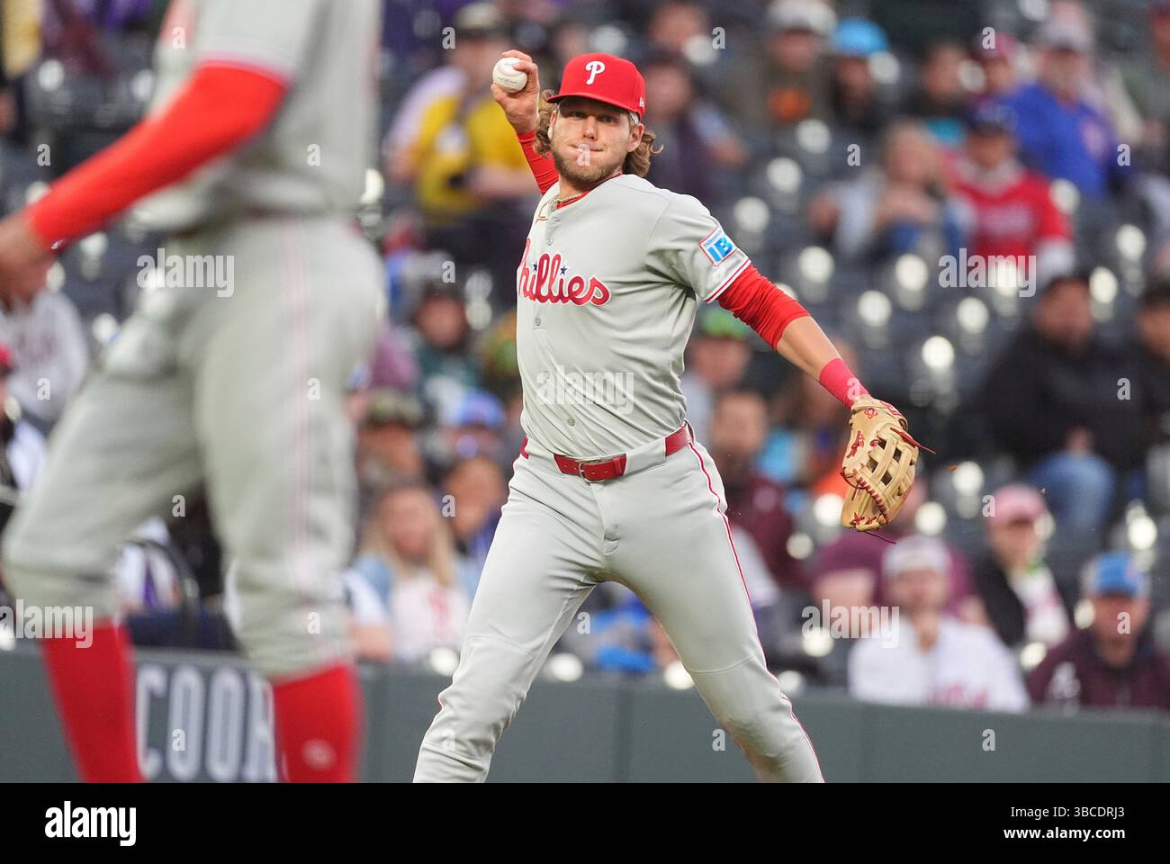 Philadelphia Phillies third baseman Alec Bohm throws to first base to ...