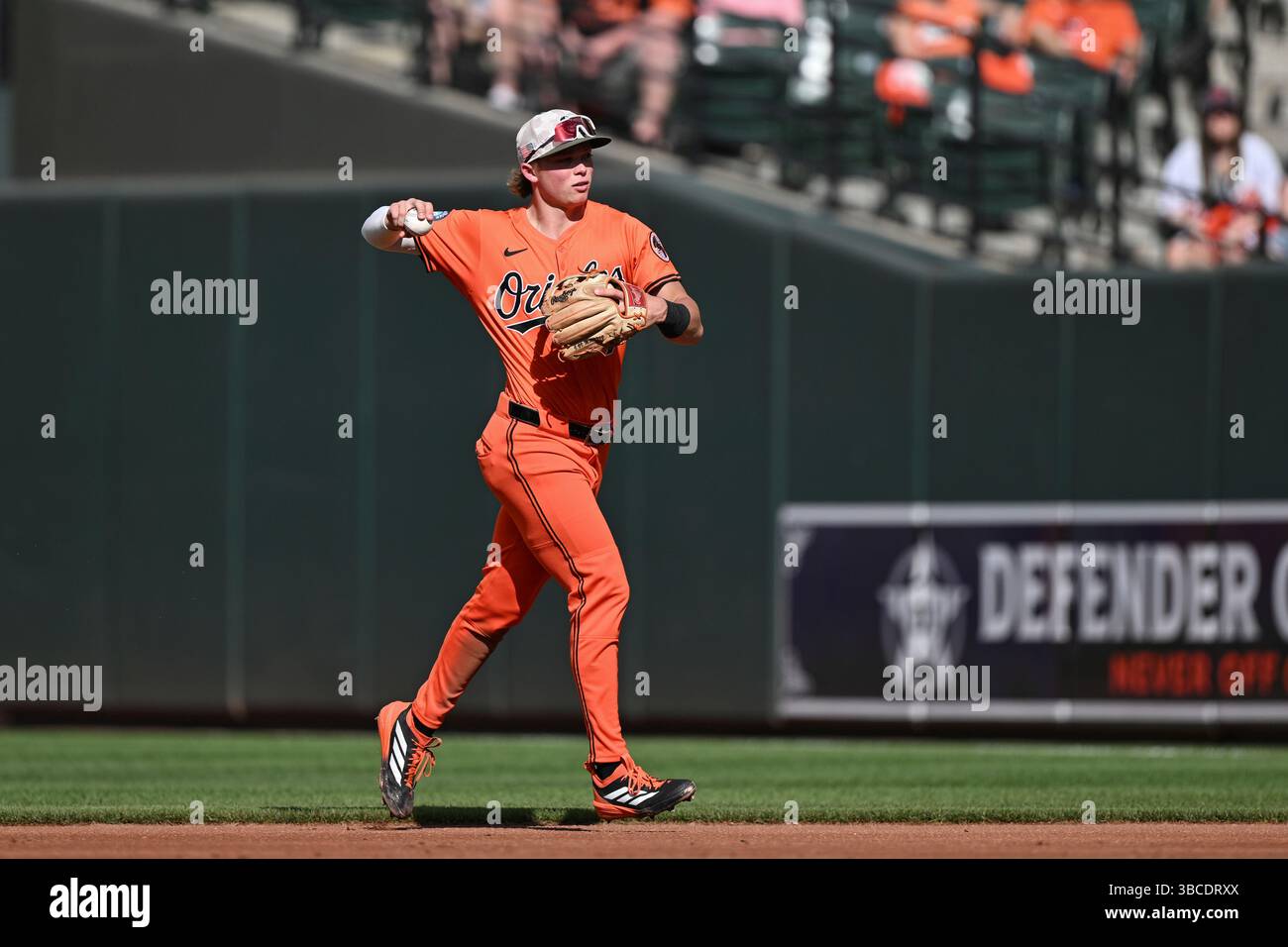 Baltimore Orioles second baseman Jackson Holliday throws to first base ...