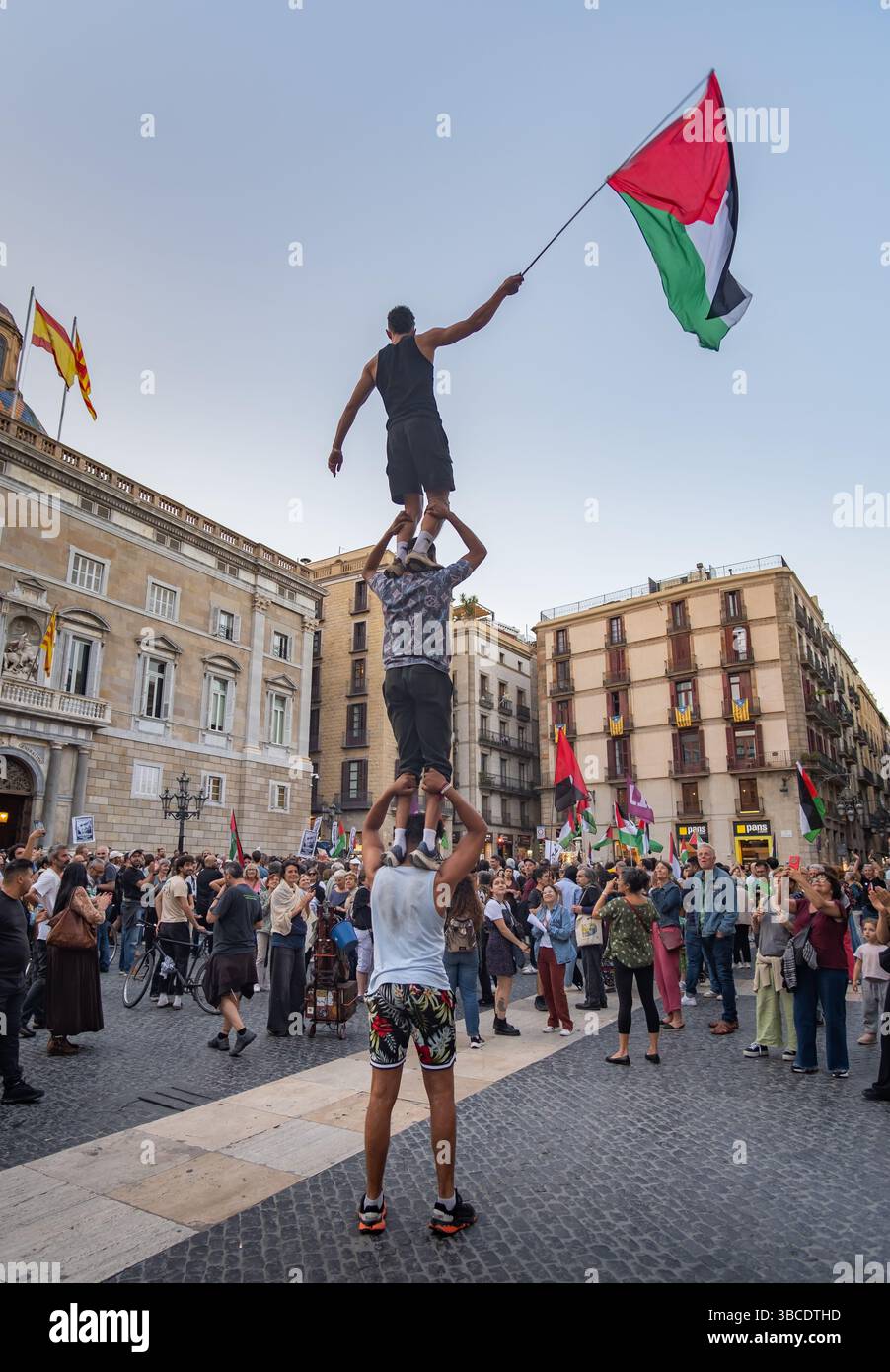 Barcelona, Spain. 19th May, 2025. Three young men are seen forming a ...