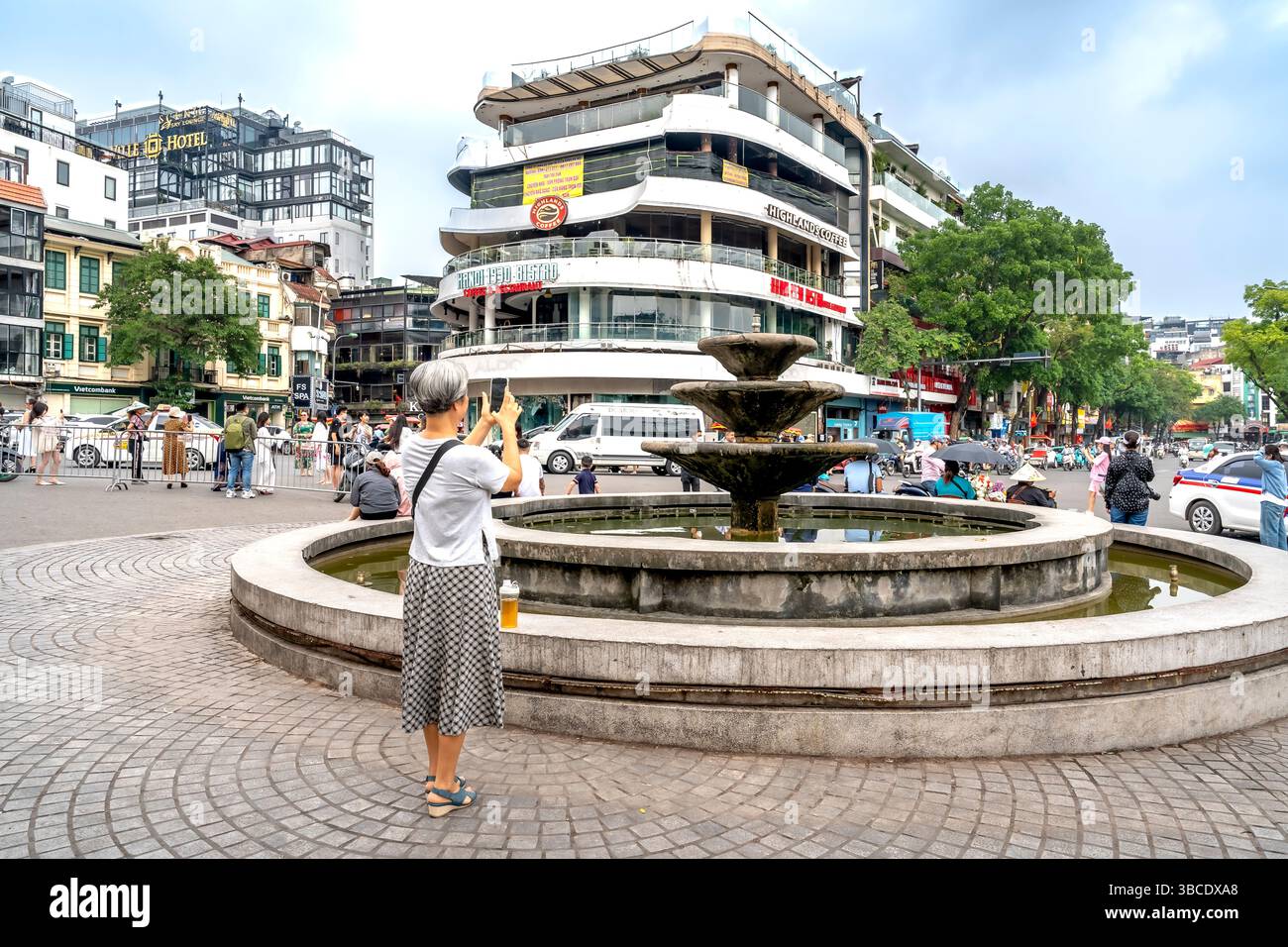 Hanoi, Viet Nam - April 24, 2025: Tourists on the streets of Hanoi, Viet Nam Stock Photo - Alamy