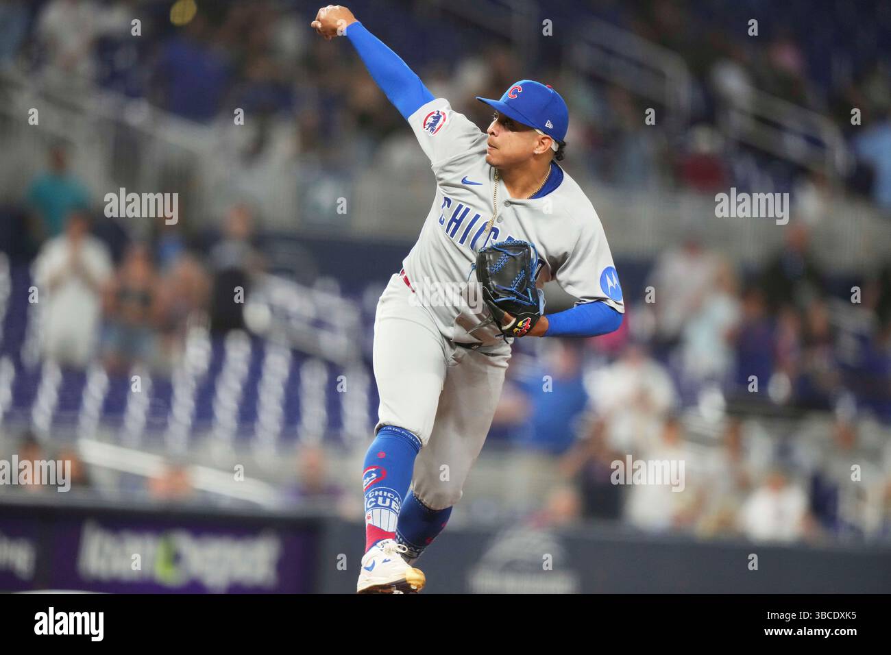 Chicago Cubs relief pitcher Daniel Palencia follows through on a ...