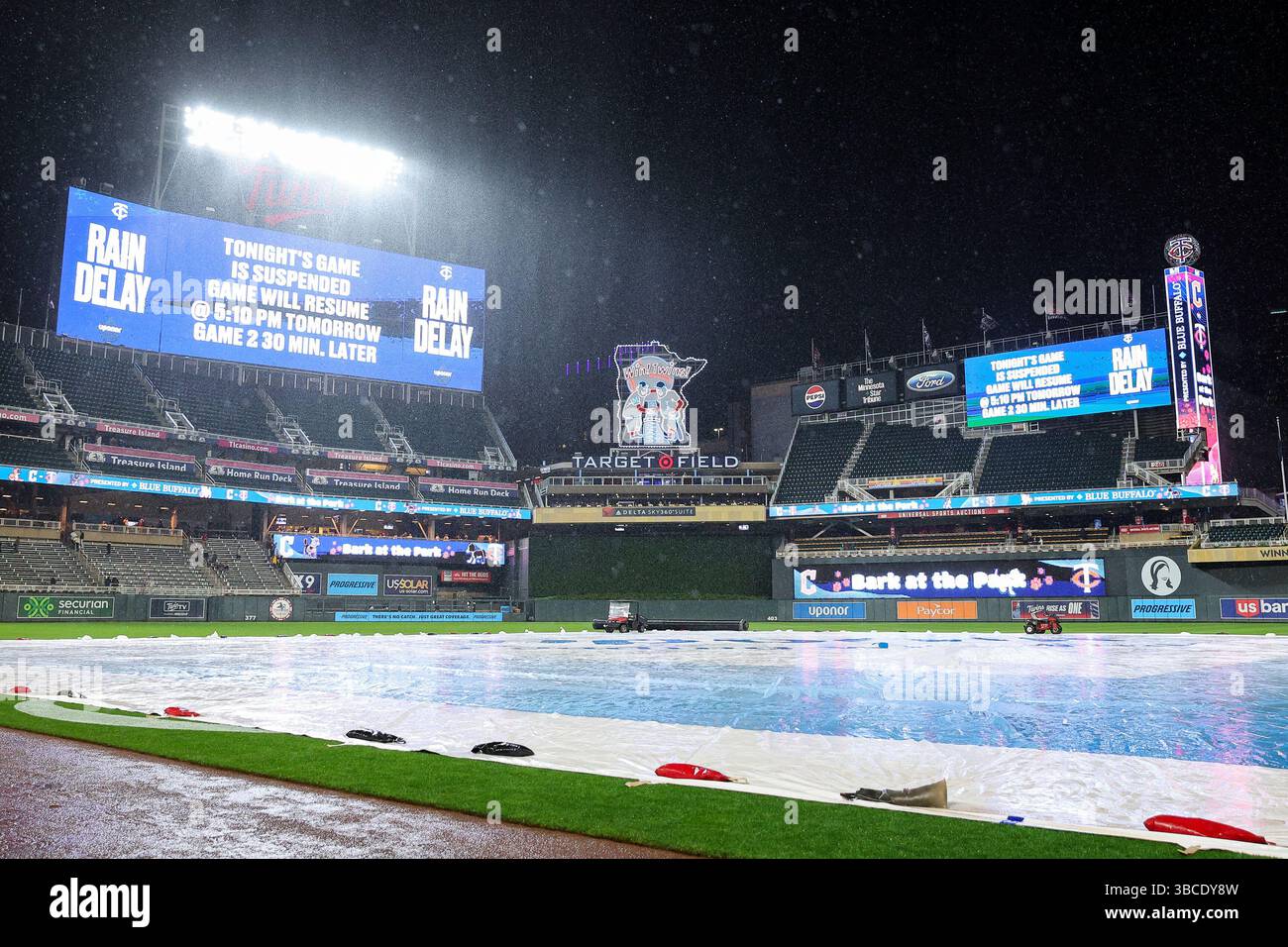The scoreboard announces the suspension of a baseball game during the ...