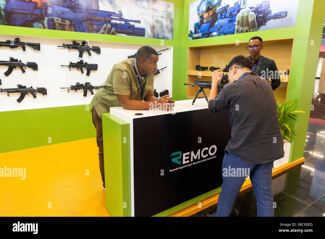 Kigali, Rwanda. 19th May, 2025. A visitor (front) learns about an ...