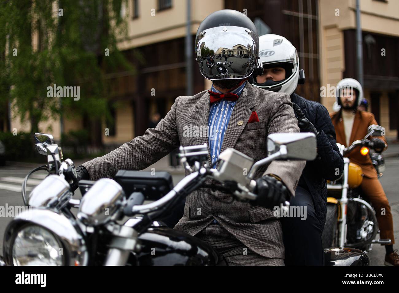 Participants take to their motorcycles prior to the Distinguished ...