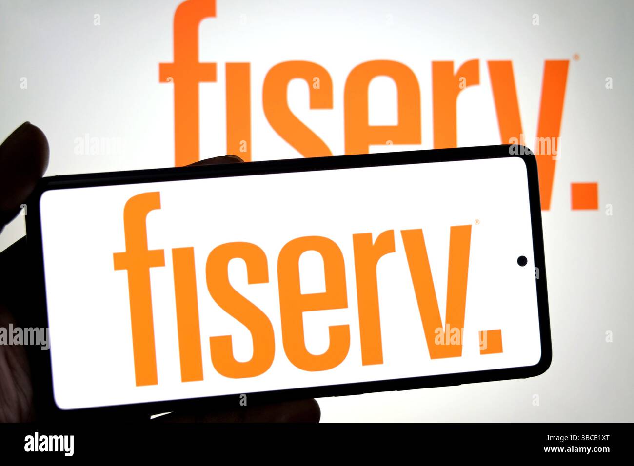 India. 18th May, 2025. In this photo illustration, a Fiserv logo is ...