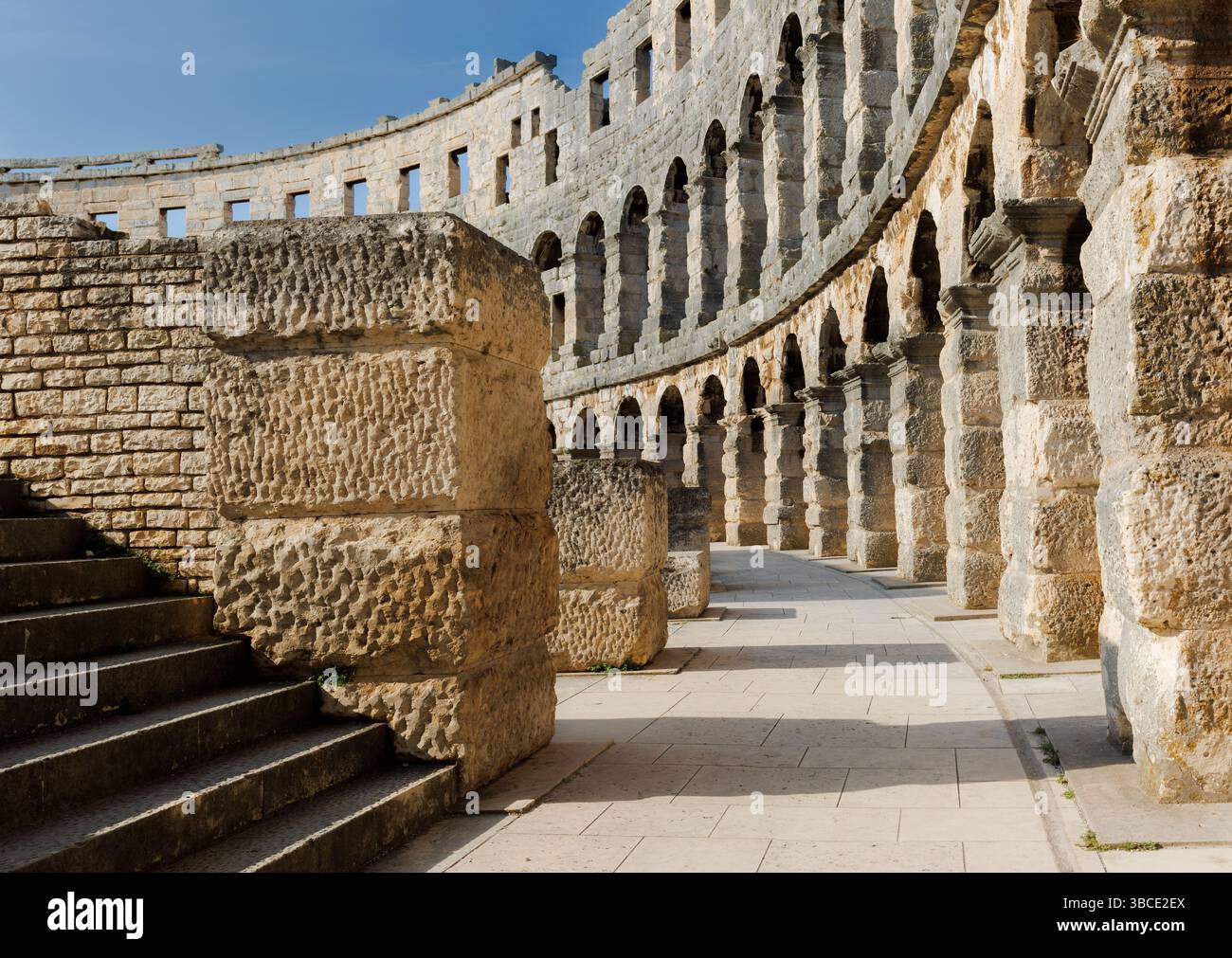 Ancient heritage in Pula, Istria, Croatia. Arches of monumental ancient ...