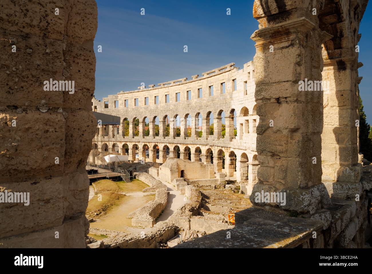 Ancient heritage in Pula, Istria, Croatia. Arches of monumental ancient ...