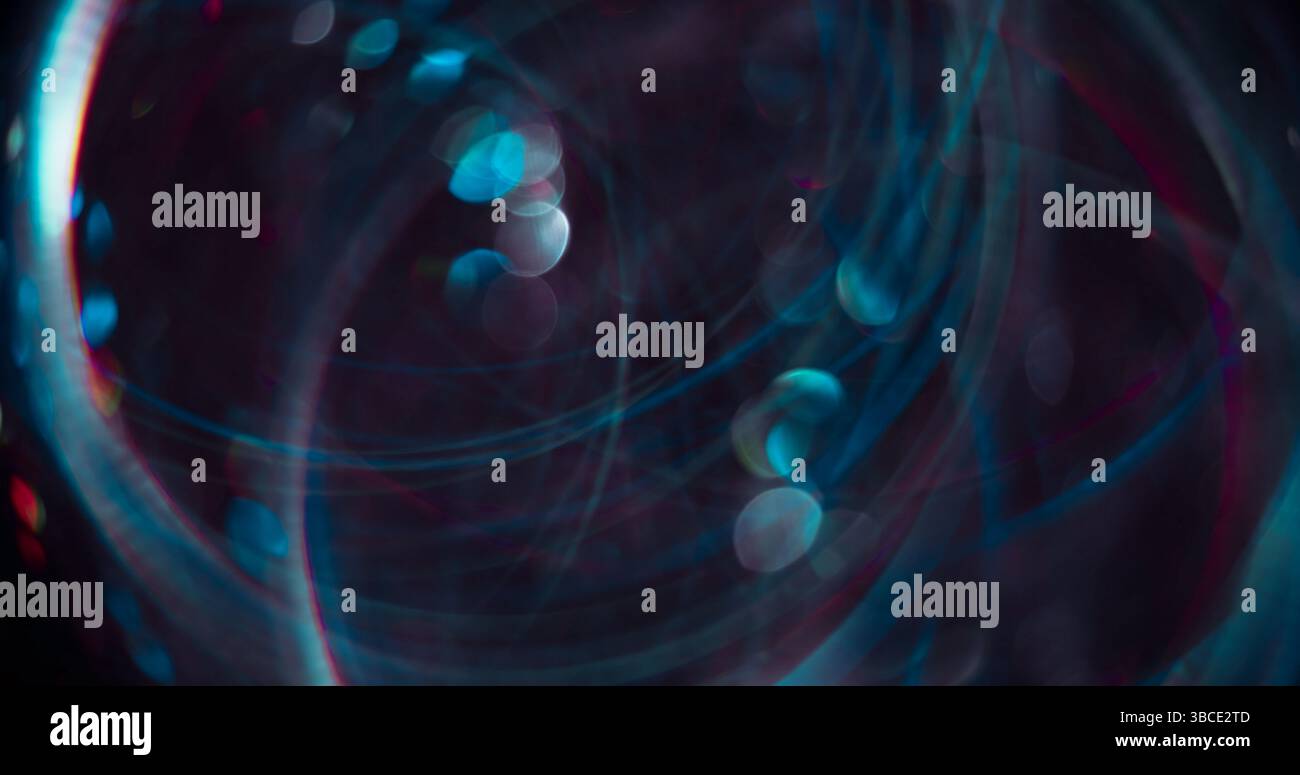 Lens flare. Blur night glow. Multicolored blue round radiance on dark ...