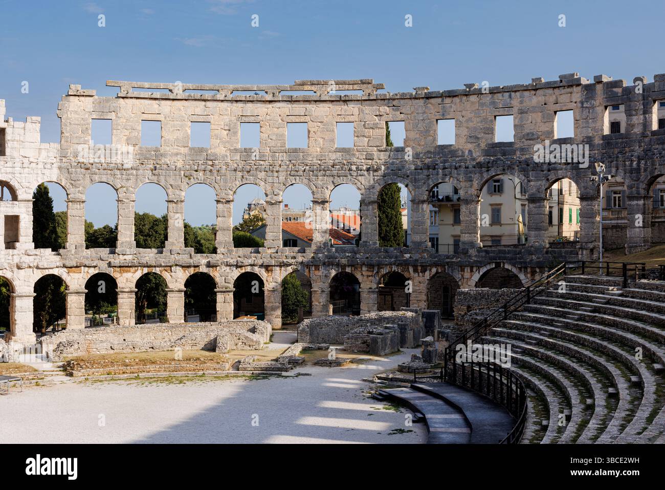 Ancient heritage in Pula, Istria, Croatia. Arches of monumental ancient ...