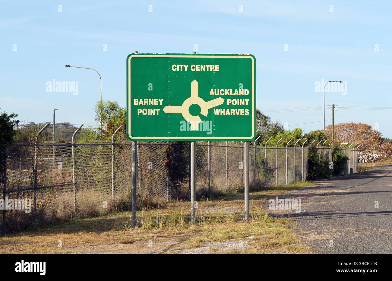 Street sign pointing towards the city centre, Barney Point and Auckland ...