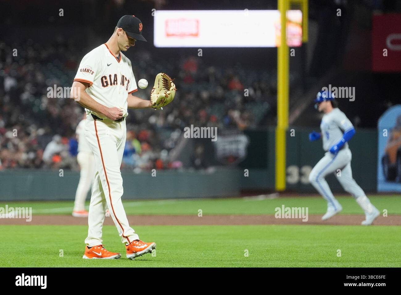 San Francisco Giants pitcher Tyler Rogers, left, reacts after giving up a two-run home run to ...