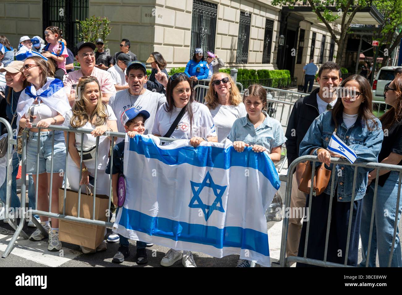 Thousands lined the sidewalks of Fifth Avenue to watch the Israel Day ...
