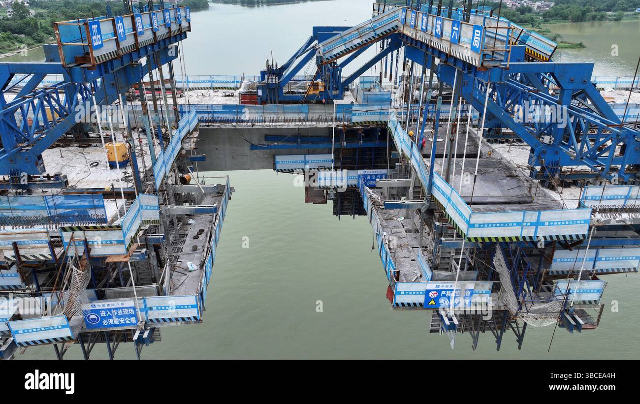 Workers are engaged in construction work at the construction site of ...