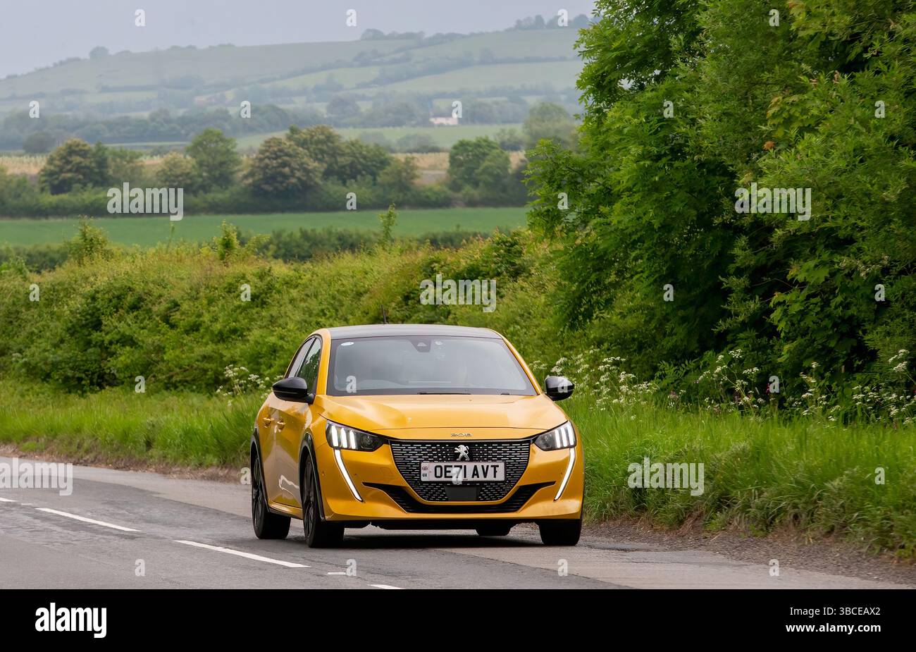 Upper Winchendon,Bucks,UK - May 18th 2025: 2022 yellow Peugeot 208 gt ...