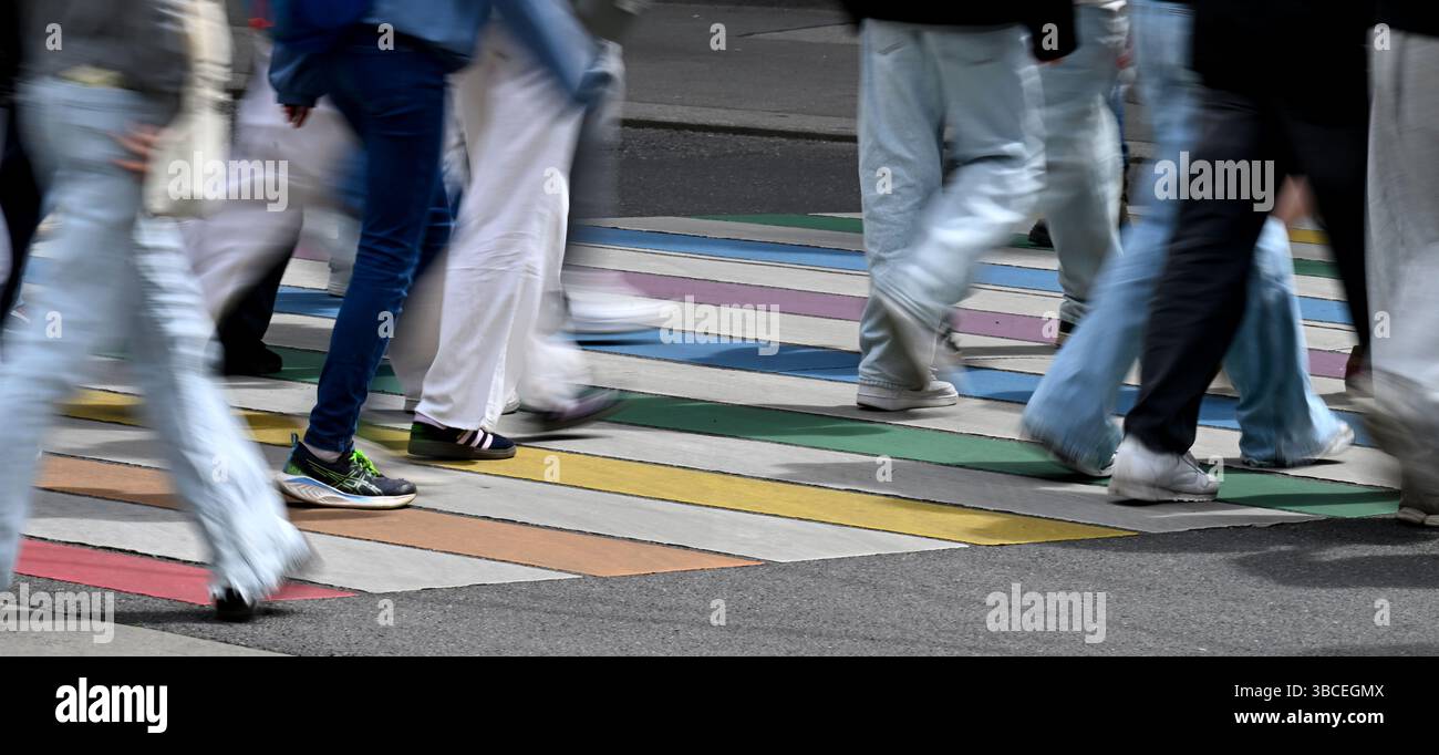 THEME PICTURE - People on a pedestrian crossing in rainbow colors in ...