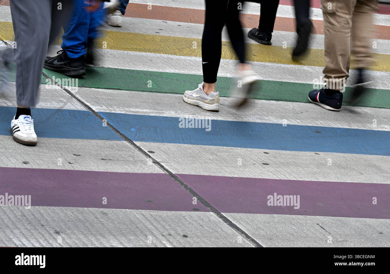 THEME PICTURE - People on a pedestrian crossing in rainbow colors in ...