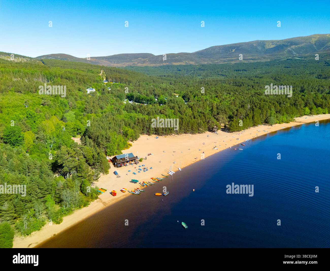 Aerial view of beach and watersports centre at Loch Morlich, Badenoch ...