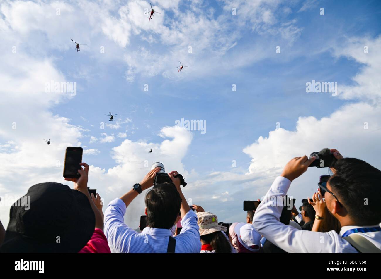 Langkawi, Malaysia. 20th May, 2025. People watch an aerobatic show at ...