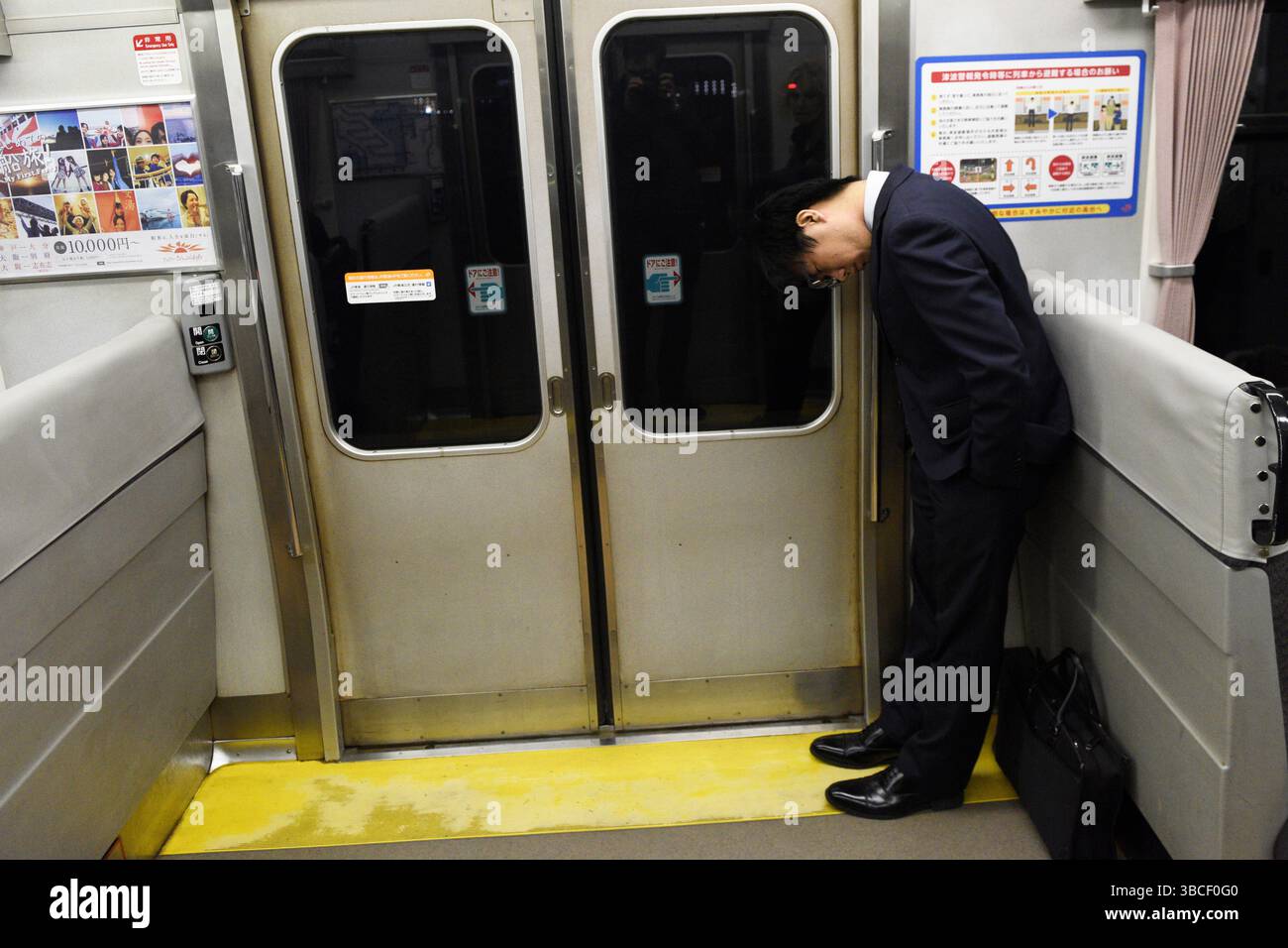 Japanese man nodding off hi-res stock photography and images - Alamy