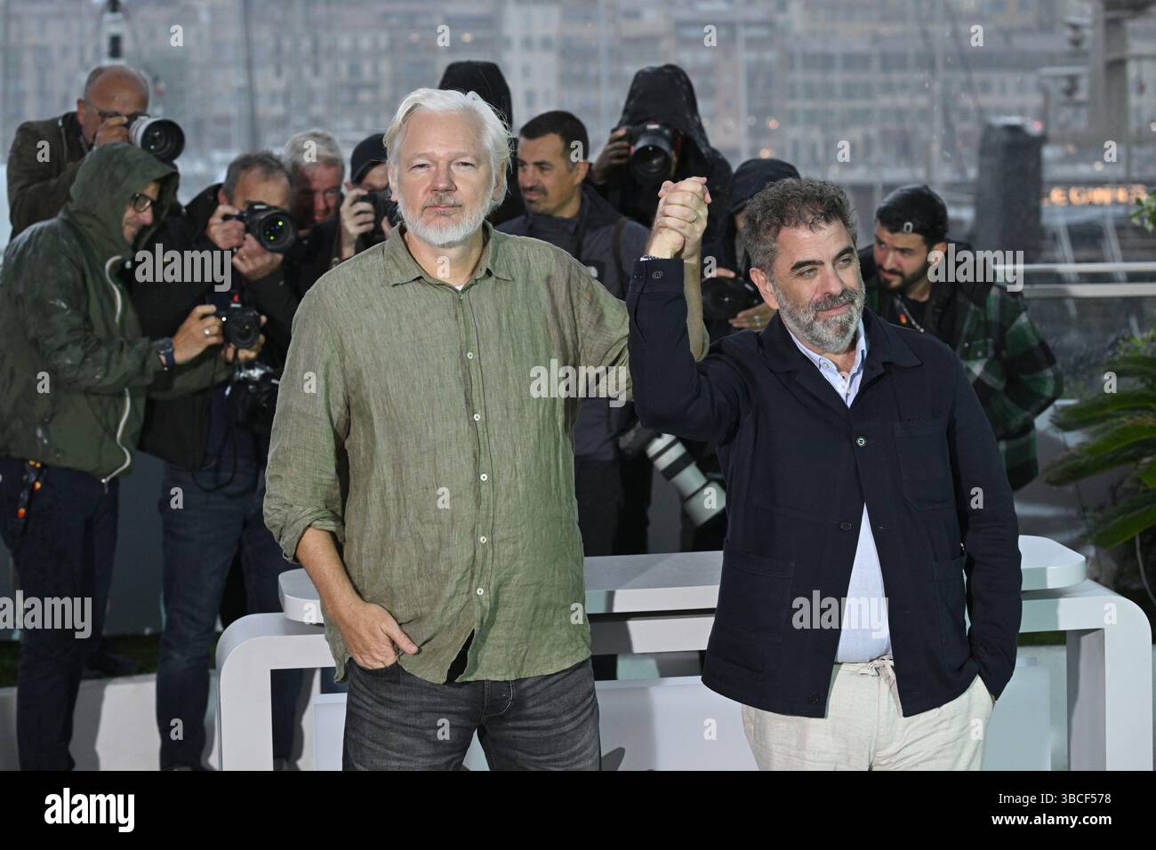 Julian Assange and director Eugene Jarecki during the photocall for the ...