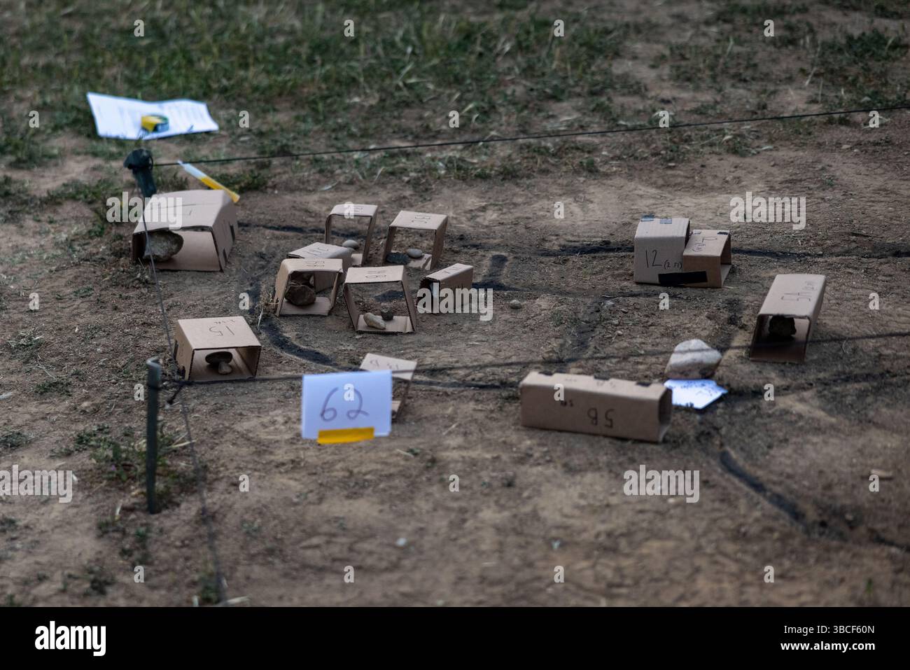 U.S. Marines with 1st Marine Division use a terrain model to display ...
