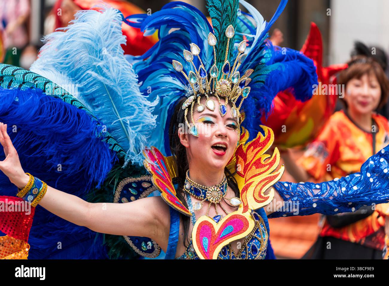 Kobe, Hyogo, Japan - May 18 2025 : Dancers in vibrant samba costumes performing enthusiastically ...