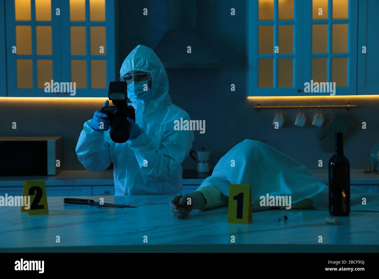 Forensic expert with camera working at crime scene and dead woman's ...