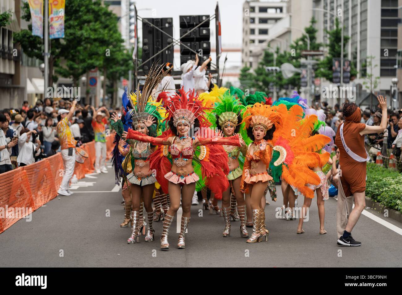 Kobe, Hyogo, Japan - May 18 2025 : Dancers in vibrant samba costumes performing enthusiastically ...