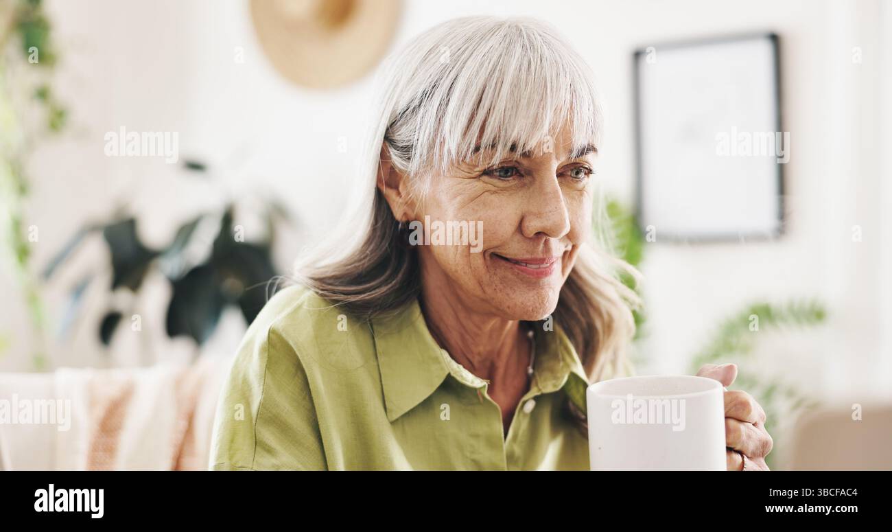 Thinking, senior woman and coffee at house for morning start, happy memory and past reflection ...