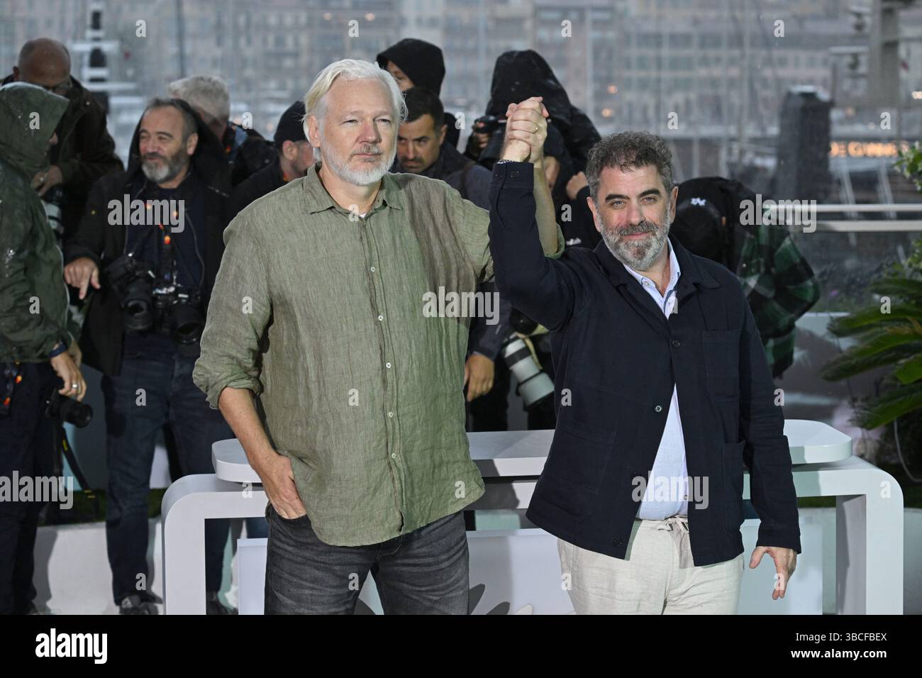 Julian Assange and director Eugene Jarecki during the photocall for the ...