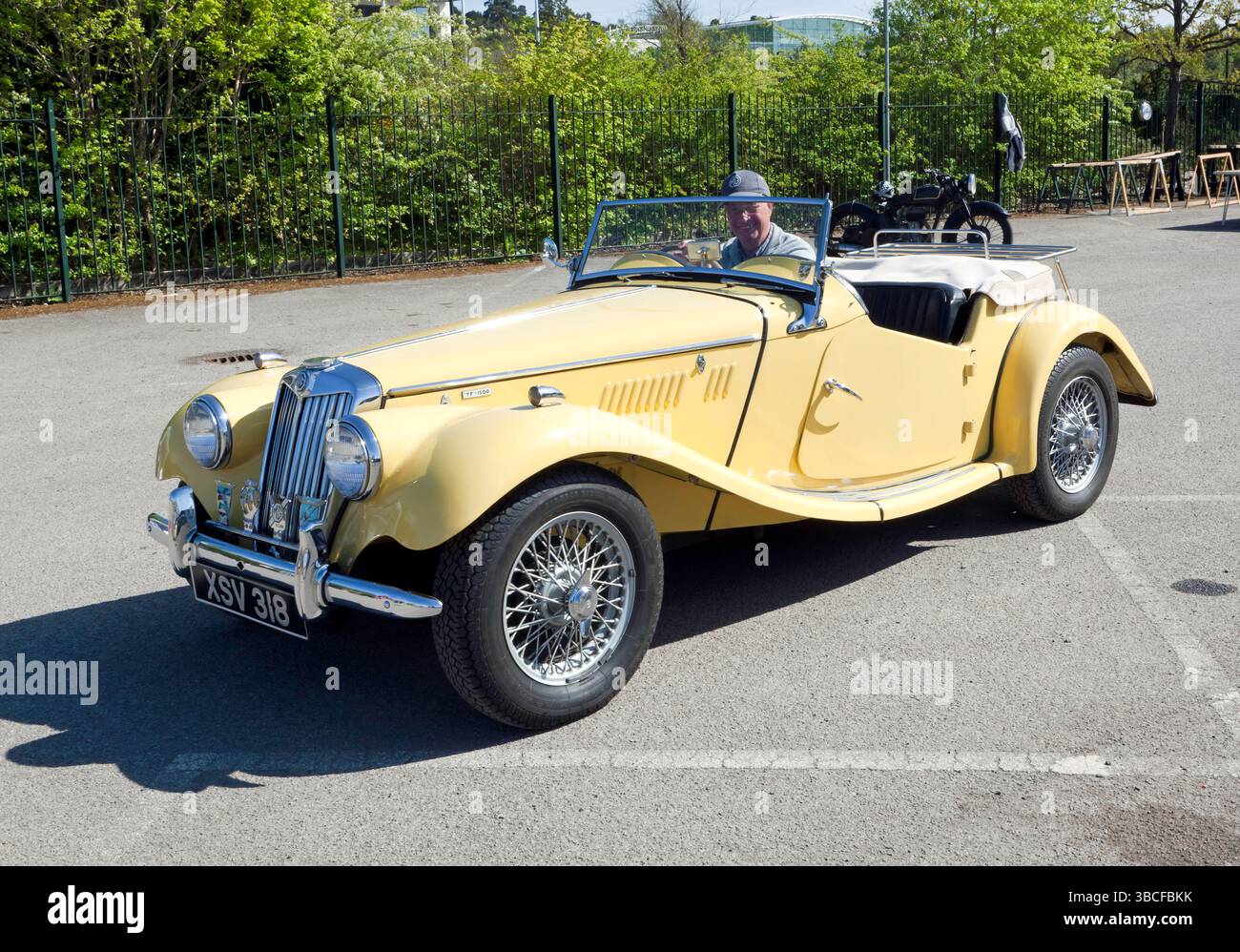 A Yellow, 1954, MG TF -1500, departing the Easter Classic Gathering at ...