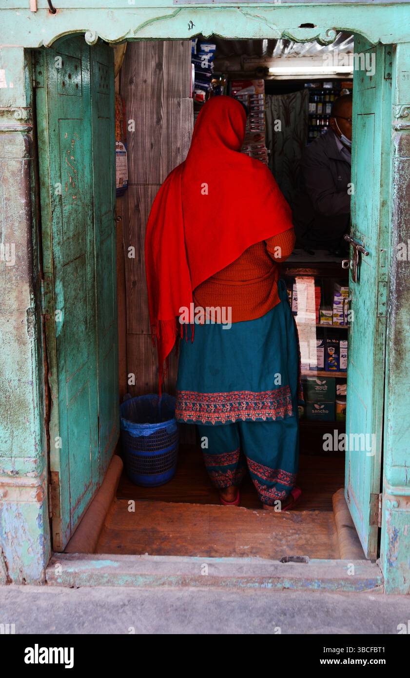 A Nepali woman standing inside a small shop in the old town of Bhaktapur, Nepal Stock Photo - Alamy