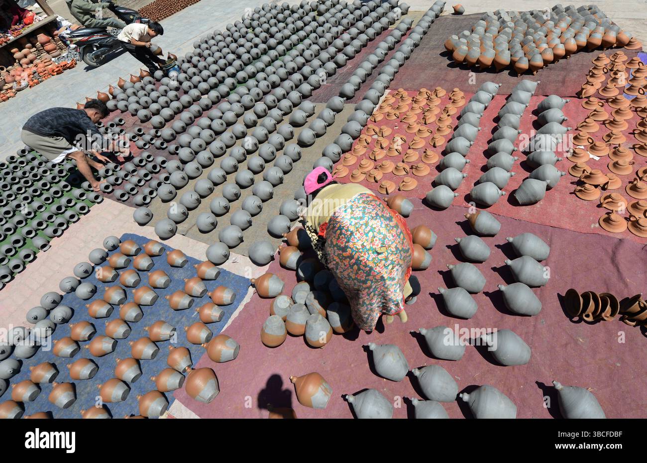 Drying pottery at Pottery Square in Bhaktapur, Nepal Stock Photo - Alamy