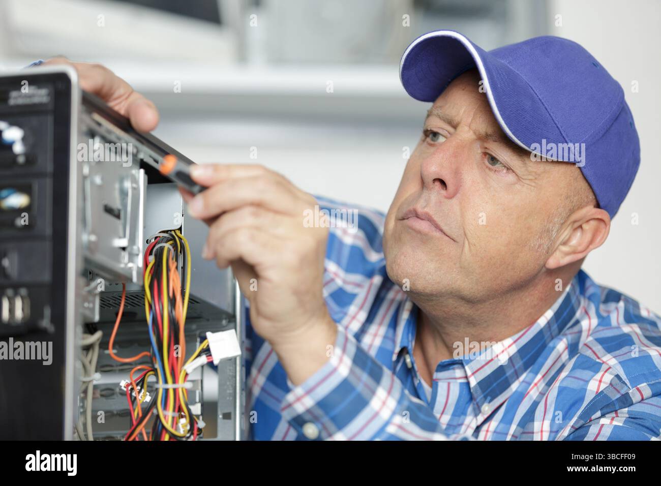 Man fixing server wires hi-res stock photography and images - Alamy