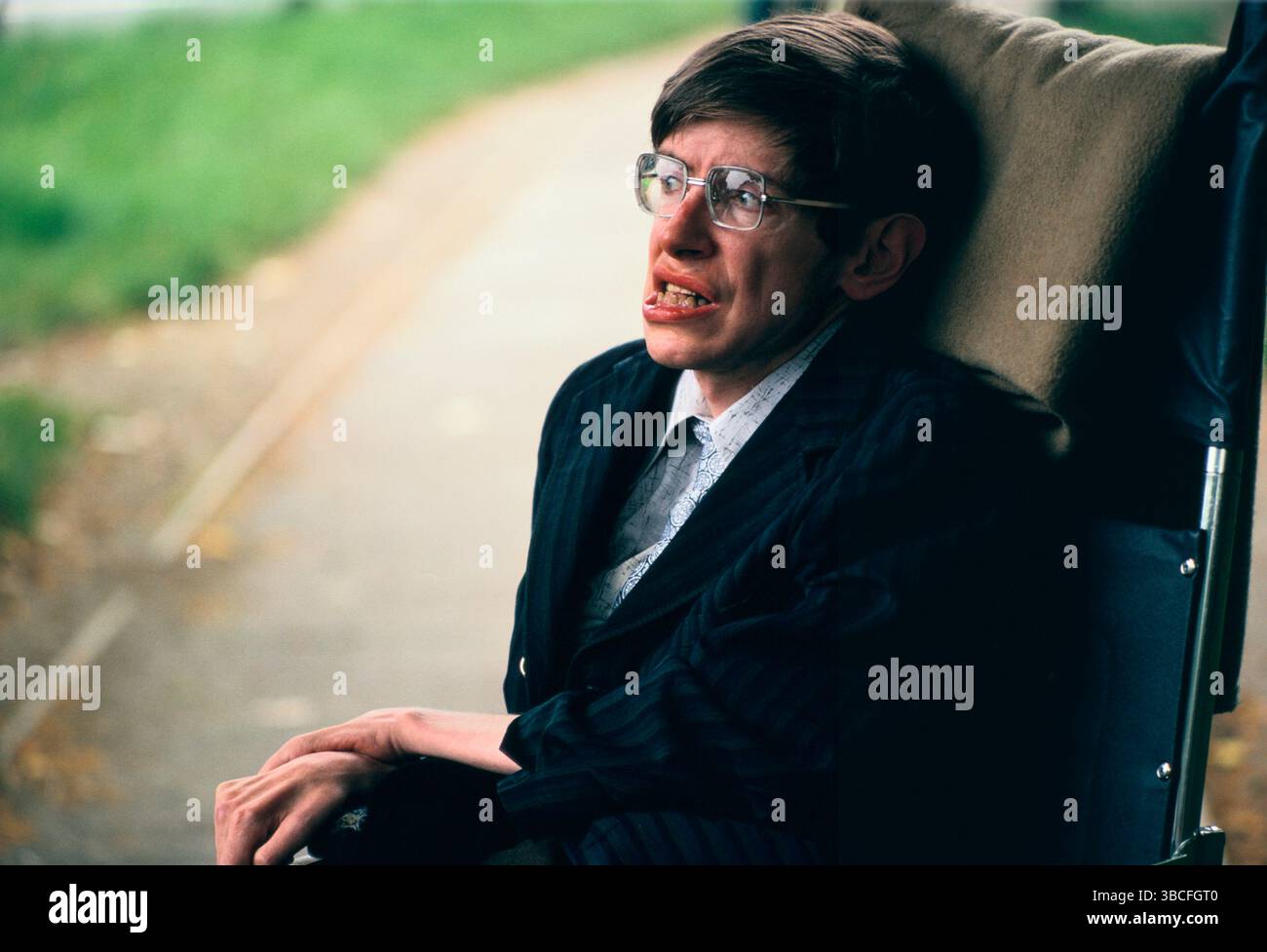 Professor Stephen Hawking in his motorised wheelchair. Cambridge ...